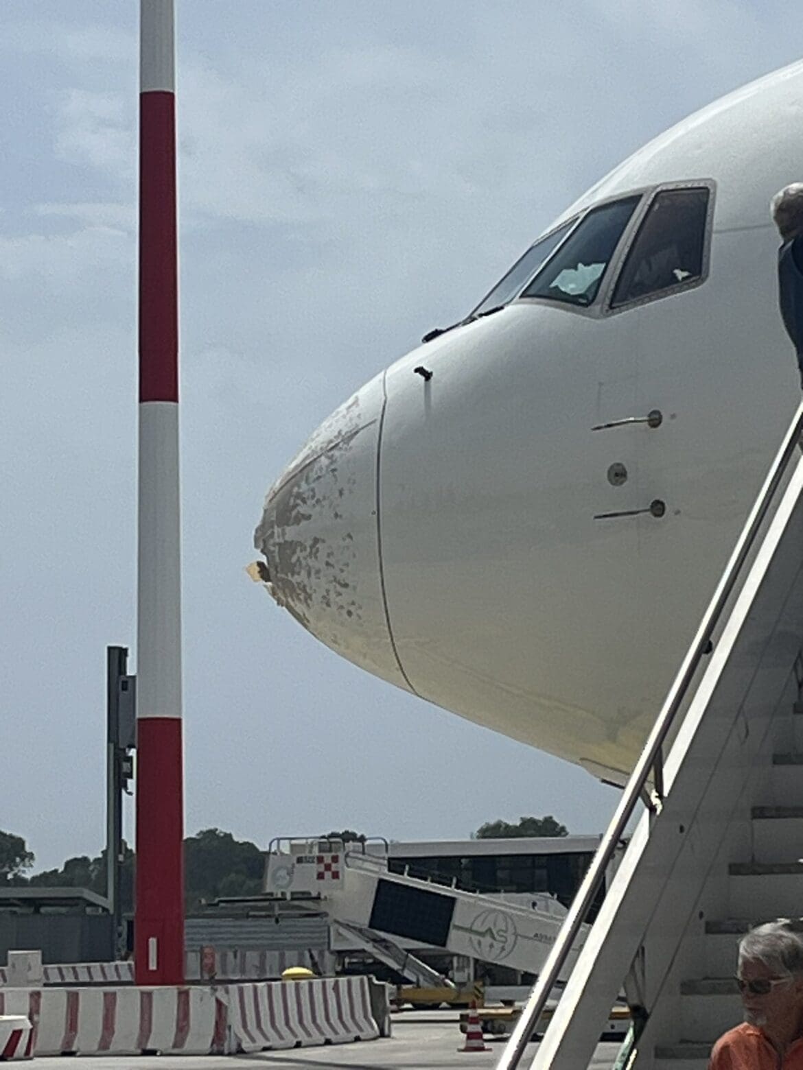 Delta Flight Makes Emergency Landing in Rome After Hailstorm Damage ...