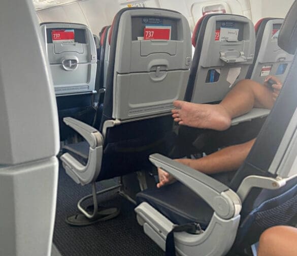 Disgusting: Keep Your Feet Off of the Seats and Tray Tables - The Bulkhead Seat